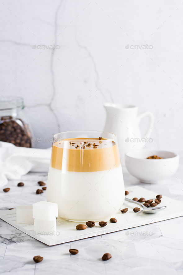 Dalgona coffee in a glass and ingredients for cooking. Social media ...
