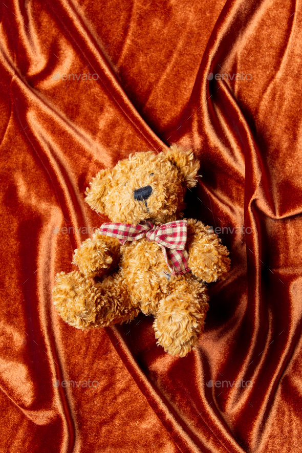 Top view on teddy bear doll on fabric background Stock Photo by Masson ...