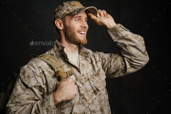 White military man wearing uniform posing with backpack Stock Photo by ...