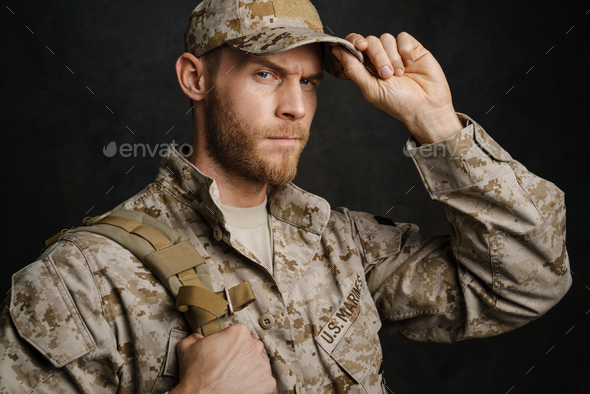 White military man wearing uniform posing with backpack Stock Photo by ...