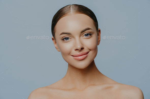 Headshot of attractive woman has beautiful facial features, natural ...