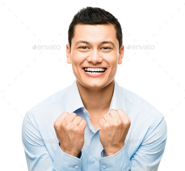 Giving props to myself. Shot of an asian businessman celebrating ...