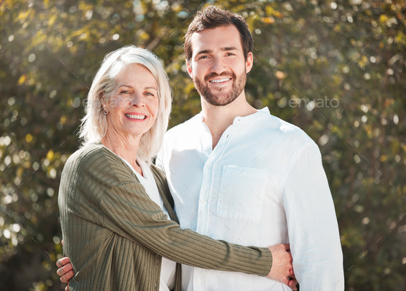 Cropped portrait of a handsome young man and his mother outdoors Stock ...