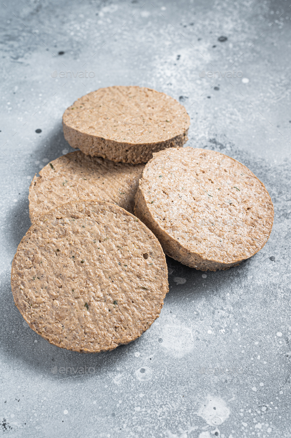 Raw Meat Free Plant Based Burger patties, vegetarian cutlets. Gray ...