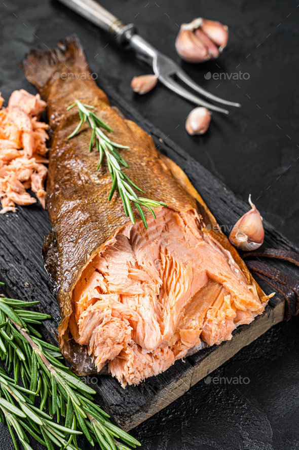 Salmon Hot smoked, trout fish meat. Black background. Top view Stock ...