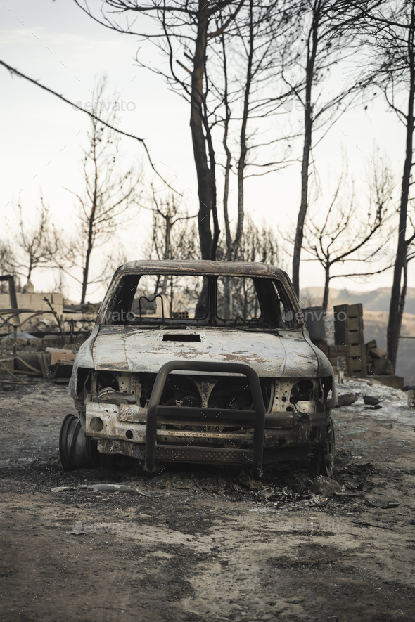Burnt car aftermath forest fire consequence of climate change ...