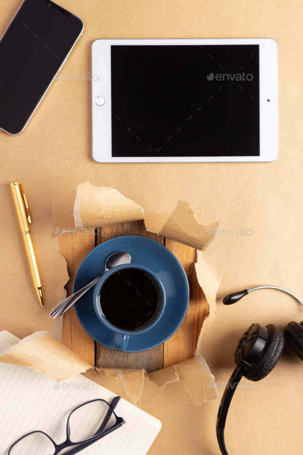 Cup of coffee and office business stationary supplies on paper ...