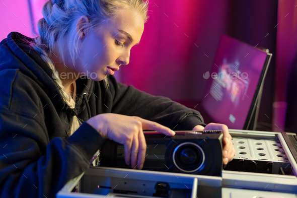 Close-up of Gamer Girl Installing New GPU Video Card in Her Gaming PC ...