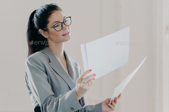Photo of female financial analyst makes report with recommendations for ...