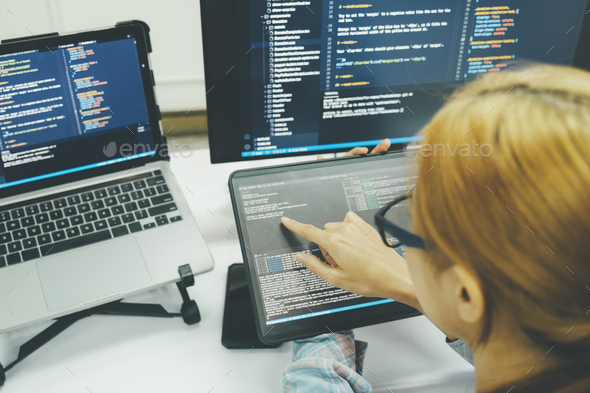 Close up programmer is coding and programming software. Stock Photo by ...