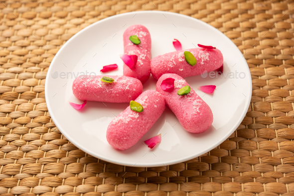Pink Chumchum or rose flavoured chum chum or cham cham, indian and ...