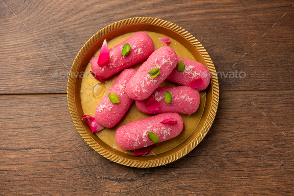 Pink Chumchum or rose flavoured chum chum or cham cham, indian and ...
