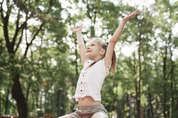 Caucasian girl with hand raised Stock Photo by gpointstudio | PhotoDune