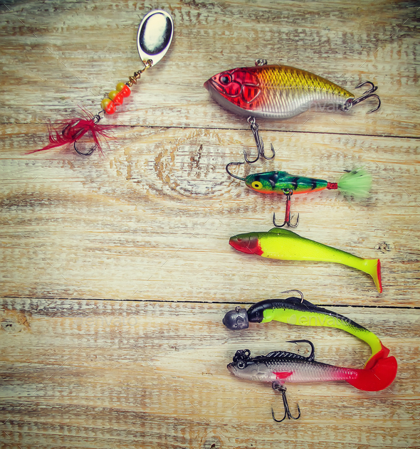 fishing tackles for anglers - swimmers, plummets and tools on wooden ...