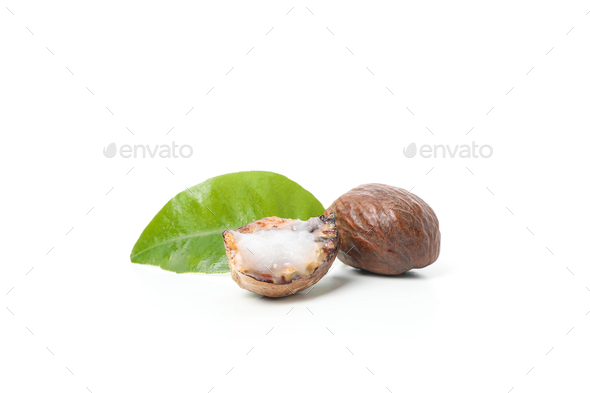 Shea nut halves isolated on white background Stock Photo by AtlasComposer