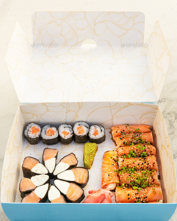 box with variety of sushi Maki, Inari, Sashimi, Nigiri, Uramaki, Gohan ...