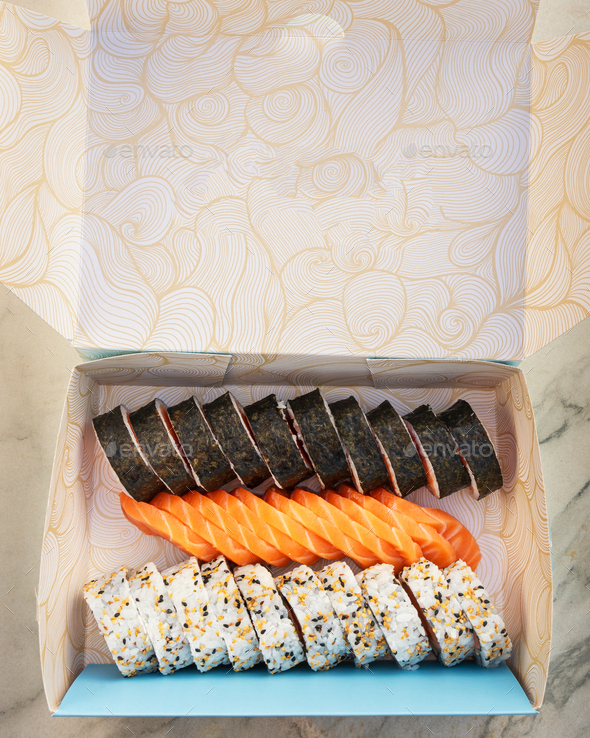 box with variety of sushi Maki, Inari, Sashimi, Nigiri, Uramaki, Gohan ...