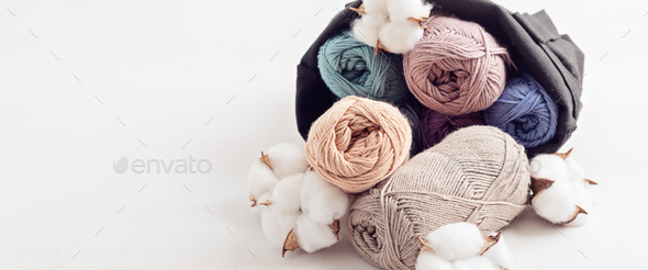 Craft hobby background with yarn in natural colors Stock Photo by OksaLy