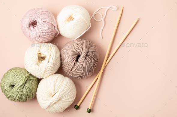 Craft hobby background with yarn in natural colors Stock Photo by OksaLy