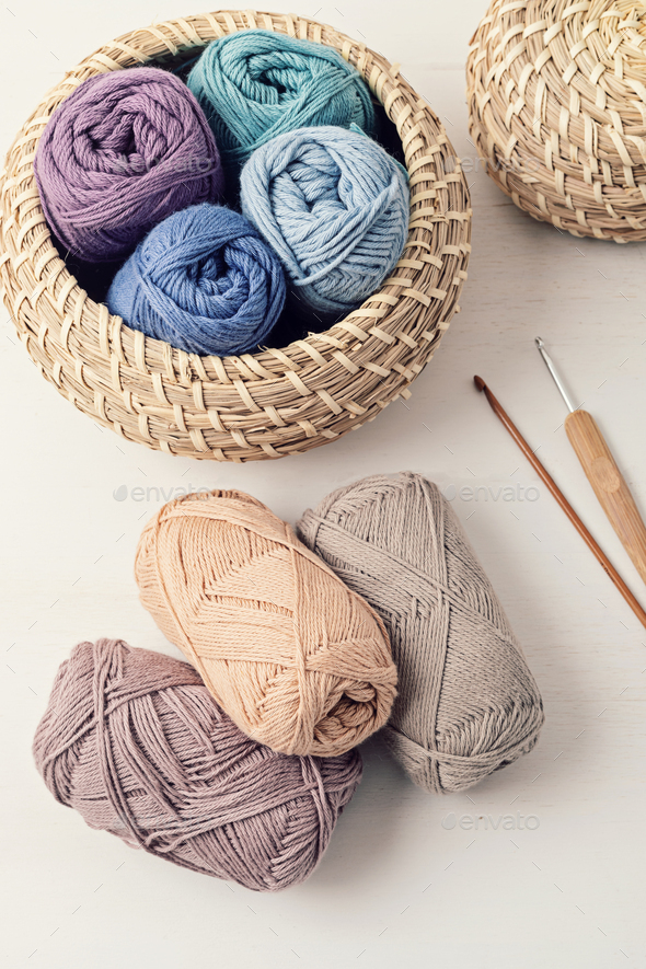 Craft hobby background with yarn in natural colors Stock Photo by OksaLy