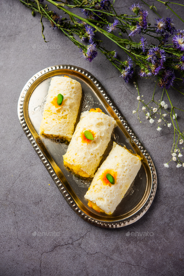 Malai Chop or Cream sandwich made using filling Rasgulla or Gulab jamun ...