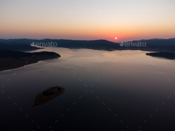 Aerial panoramic view of Island on a Batak Reservoir in sunrise ...