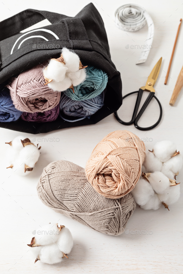 Craft hobby background with yarn in natural colors Stock Photo by OksaLy