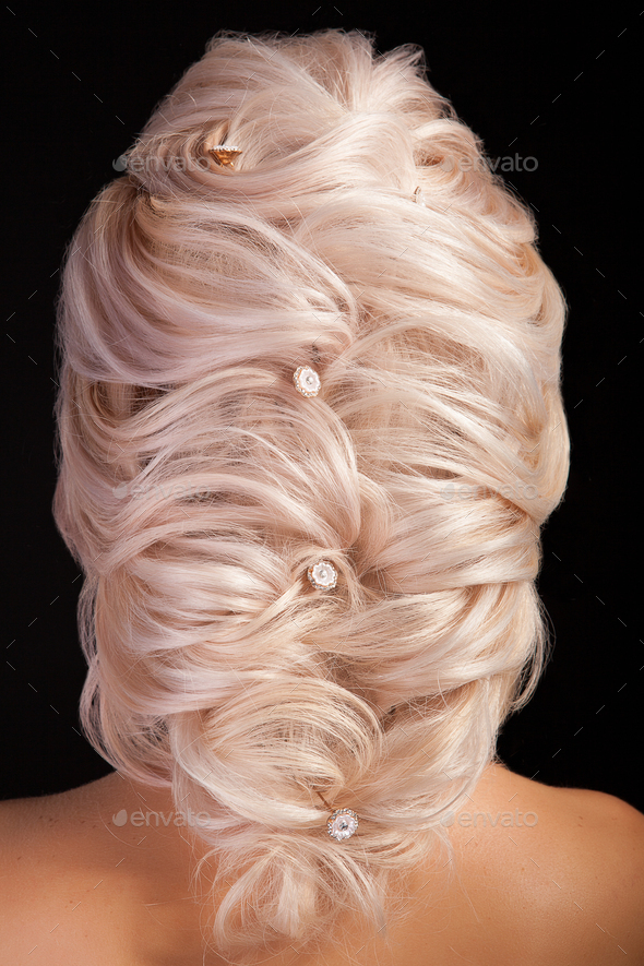 Caucasian woman with beautiful long blonde hair and glamour coiffure on ...
