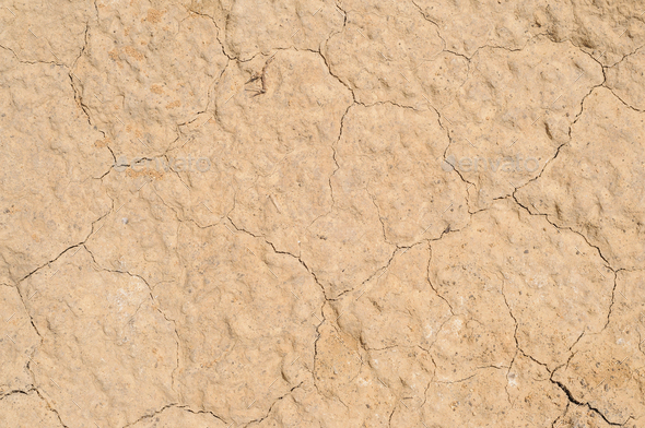 Clay soil texture background, dried surface Stock Photo by staRRush