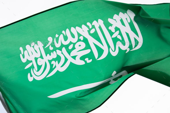 Official flag of the Kingdom of Saudi Arabia. Stock Photo by erika8213
