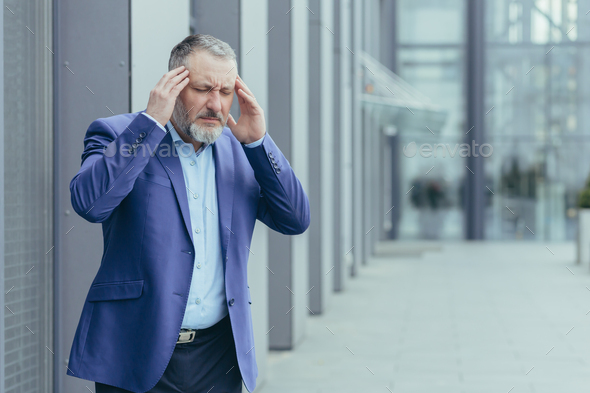 Senior gray haired businessman sick outside office building, man ...