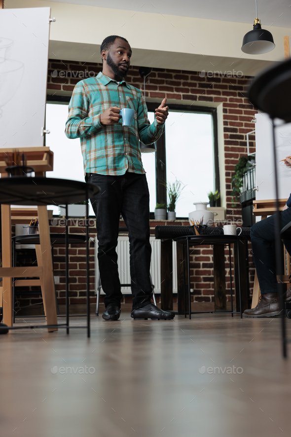 Man teacher teaching students graphic illustration technique Stock ...