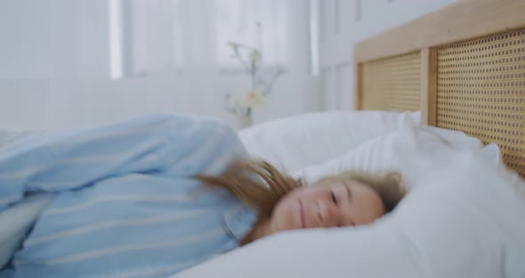 Tired Girl Falls Face Down in the Pillow. Tired Woman Falling on Bed ...