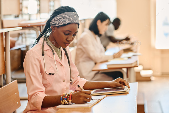 Medical student studying at university Stock Photo by AnnaStills ...