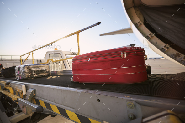 Loading of luggage to airplane Stock Photo by Chalabala | PhotoDune