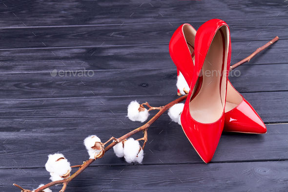 Top view red high heel shoes with cotton fluffy flower. - Stock Image ...