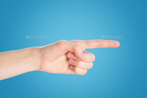 Pointing gesture. Female hand shows index finger on a white background isolate Stock Photo by ...