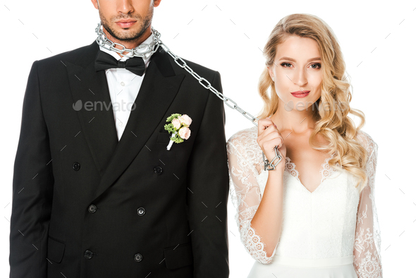smiling young bride with chain and leashed groom isolated on white ...