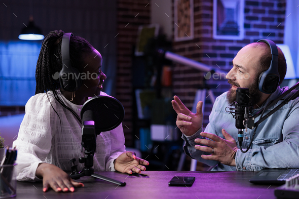 Diverse team of influencers creating channel content on podcast Stock ...