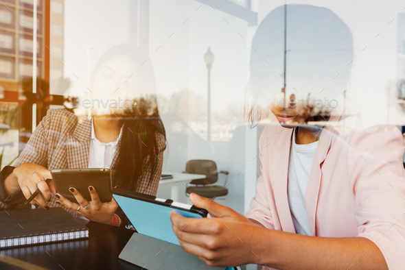 coworkers of different races in the workplace Stock Photo by Meniphoto