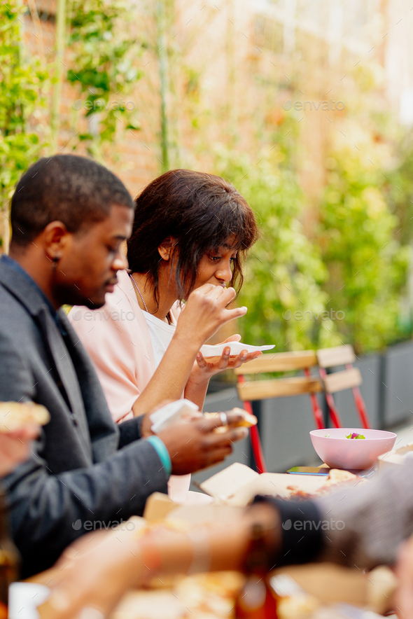people eating together in friendship Stock Photo by Meniphoto | PhotoDune