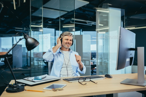 Senior and experienced business man resting at work during a break ...