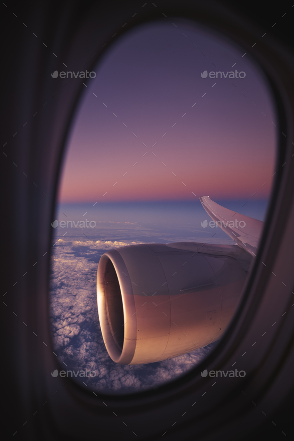 View from window of airplane during night flight Stock Photo by Chalabala