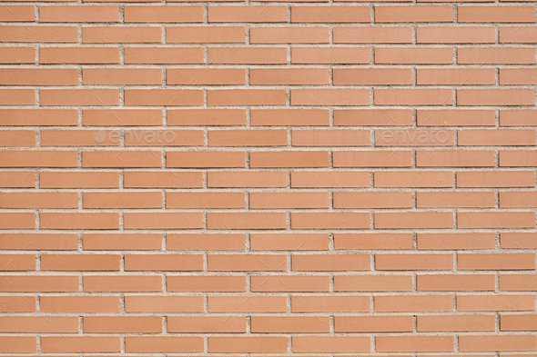 Brick wall with clean orange bricks. Background horizontal texture. Stock Photo by Ladanifer