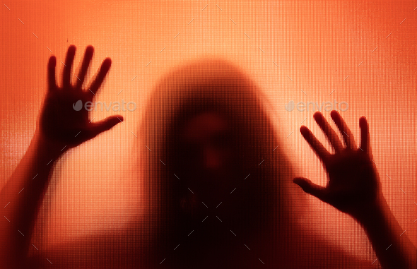 Shadowy figure behind glass - horror background Stock Photo by erika8213