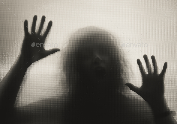 Shadowy figure behind glass - horror background Stock Photo by erika8213