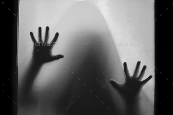 Shadowy figure behind glass - creepy, horror background Stock Photo by ...