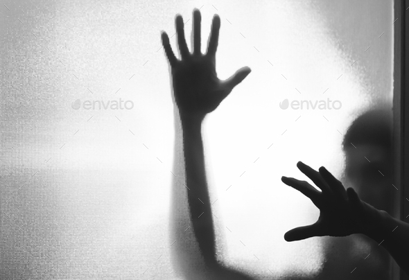 Shadowy figure behind glass - creepy, horror background Stock Photo by ...