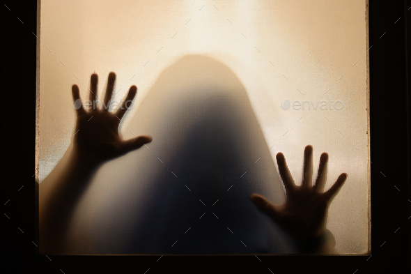 Shadowy figure behind glass - creepy, horror background Stock Photo by ...