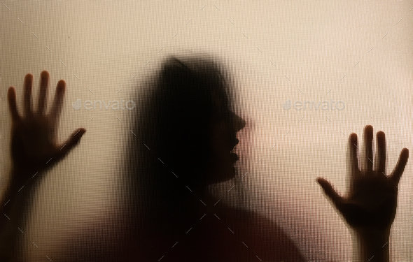 Shadowy figure behind glass - horror background Stock Photo by erika8213